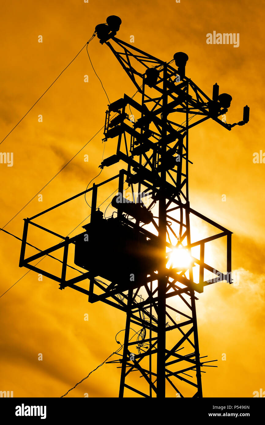 an image of a metal tower of Power Lines Stock Photo - Alamy