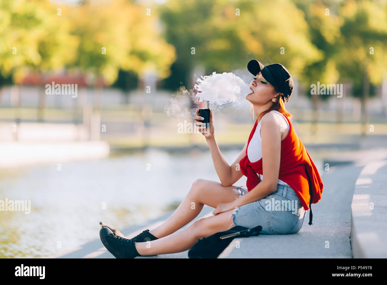 E cig woman hi-res stock photography and images - Alamy