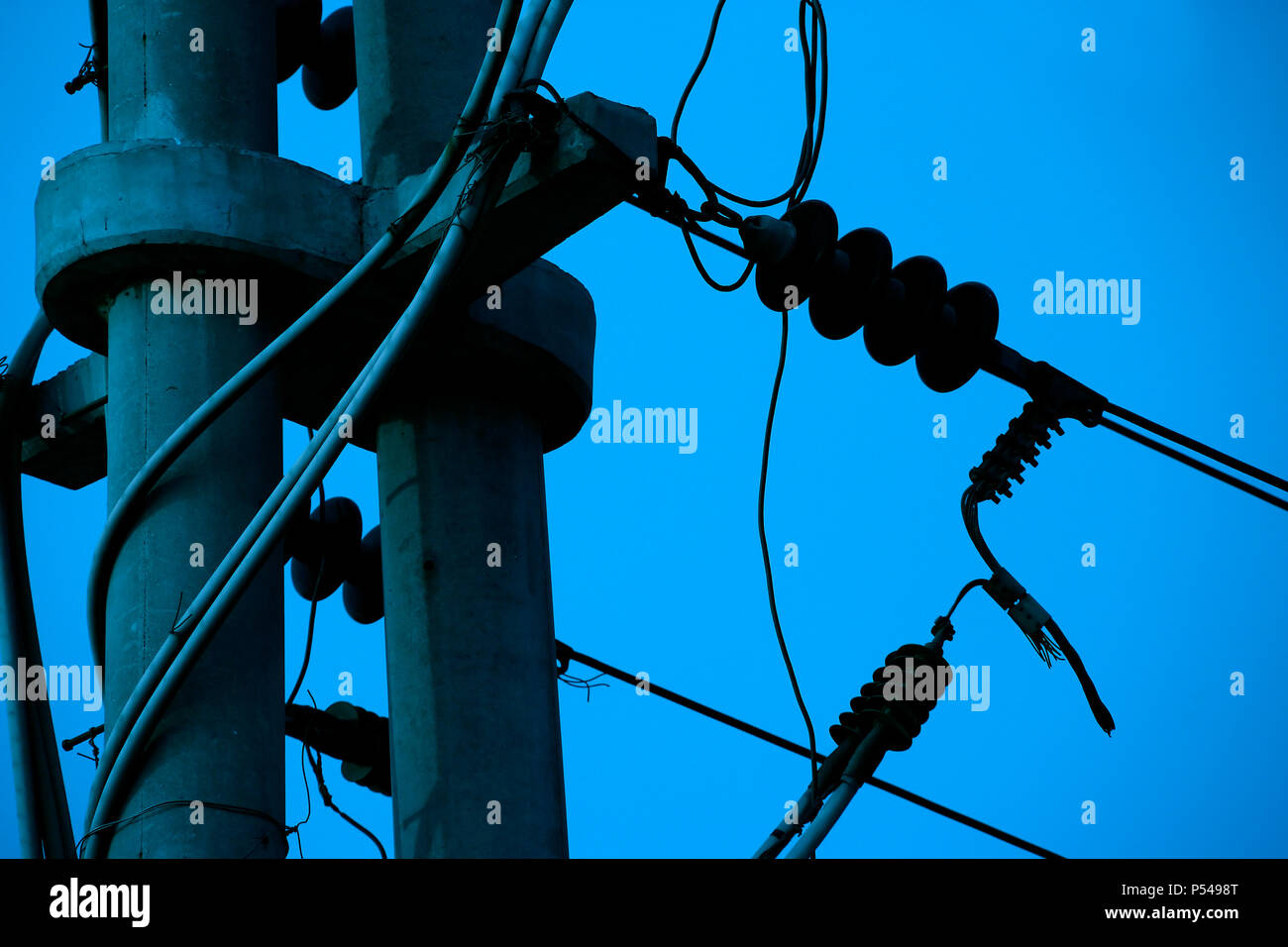 an image of a metal tower of Power Lines Stock Photo - Alamy