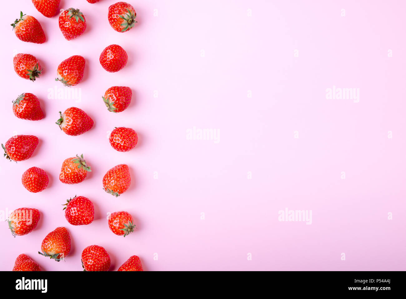 Strawberry on pastel pink background, top view. Berries pattern. Fresh ...