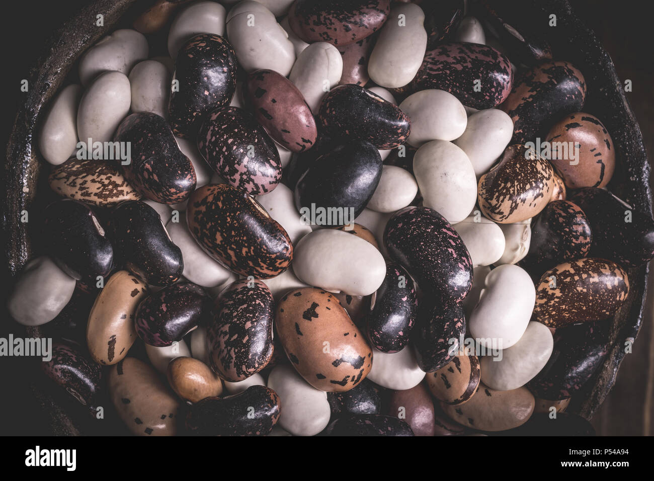 Organic Colorful Beans on Dark Wooden Background Stock Photo - Alamy