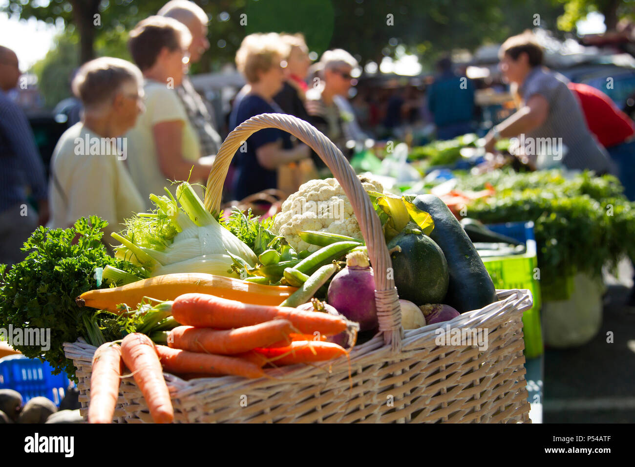 Market, basked full of vegetables Stock Photo - Alamy