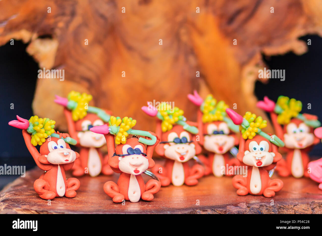 Cute Little Monkey Key Chain Made from Ceramic Clay Stock Photo - Alamy