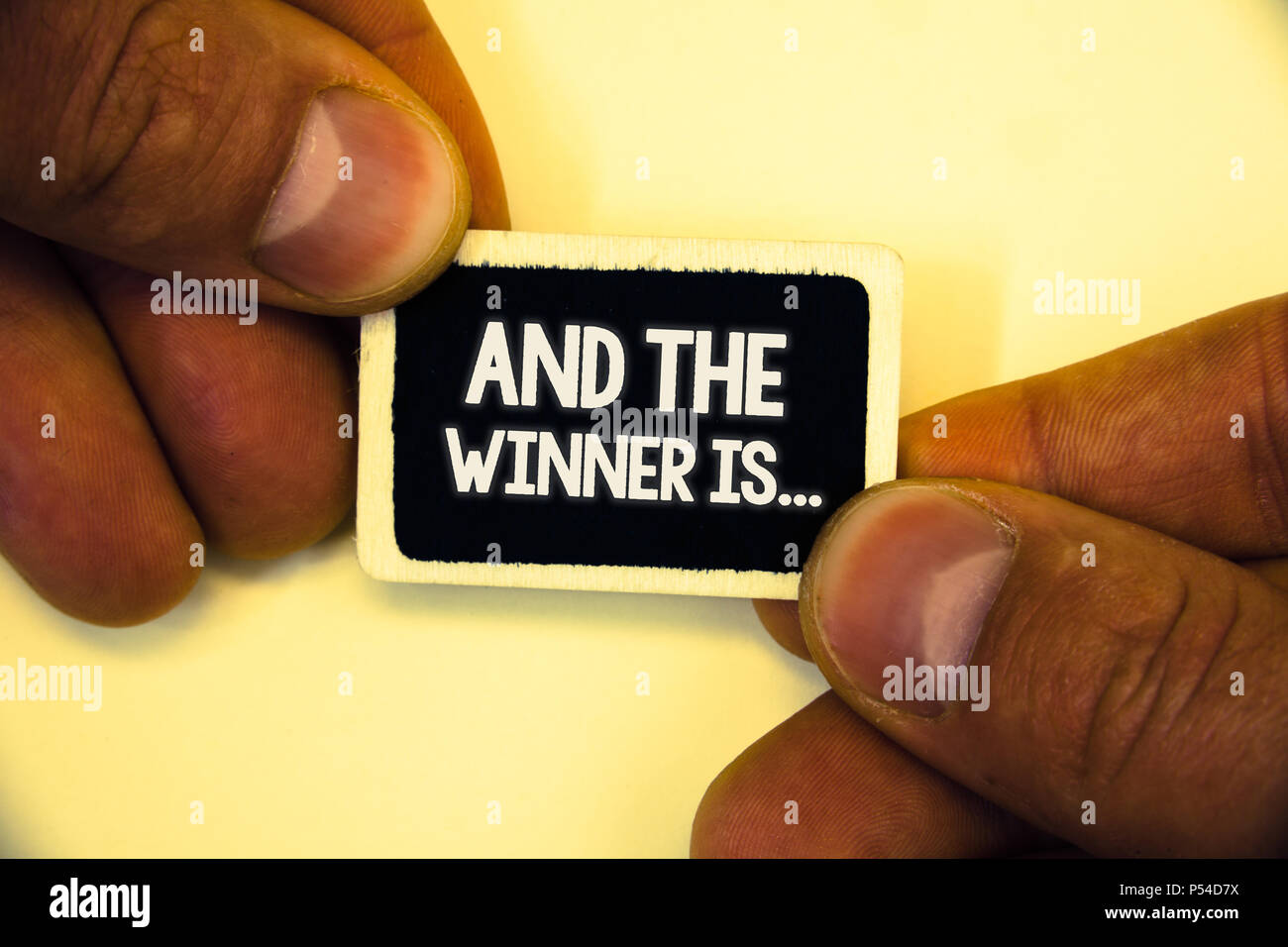 Word writing text And The Winner Is . Business concept for Announcing ...