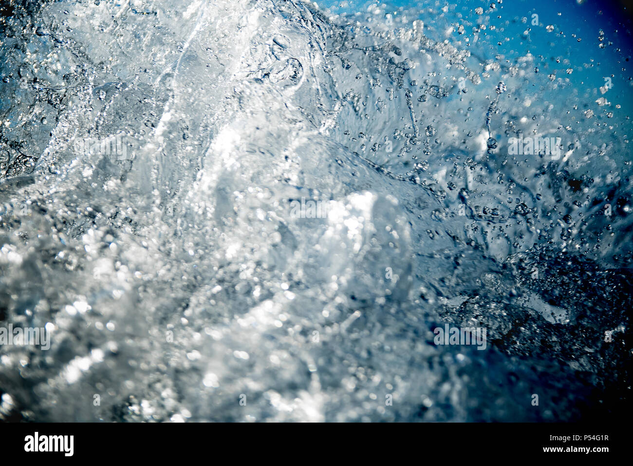 sea water splashing with a blue sky background, beautiful texture Stock ...