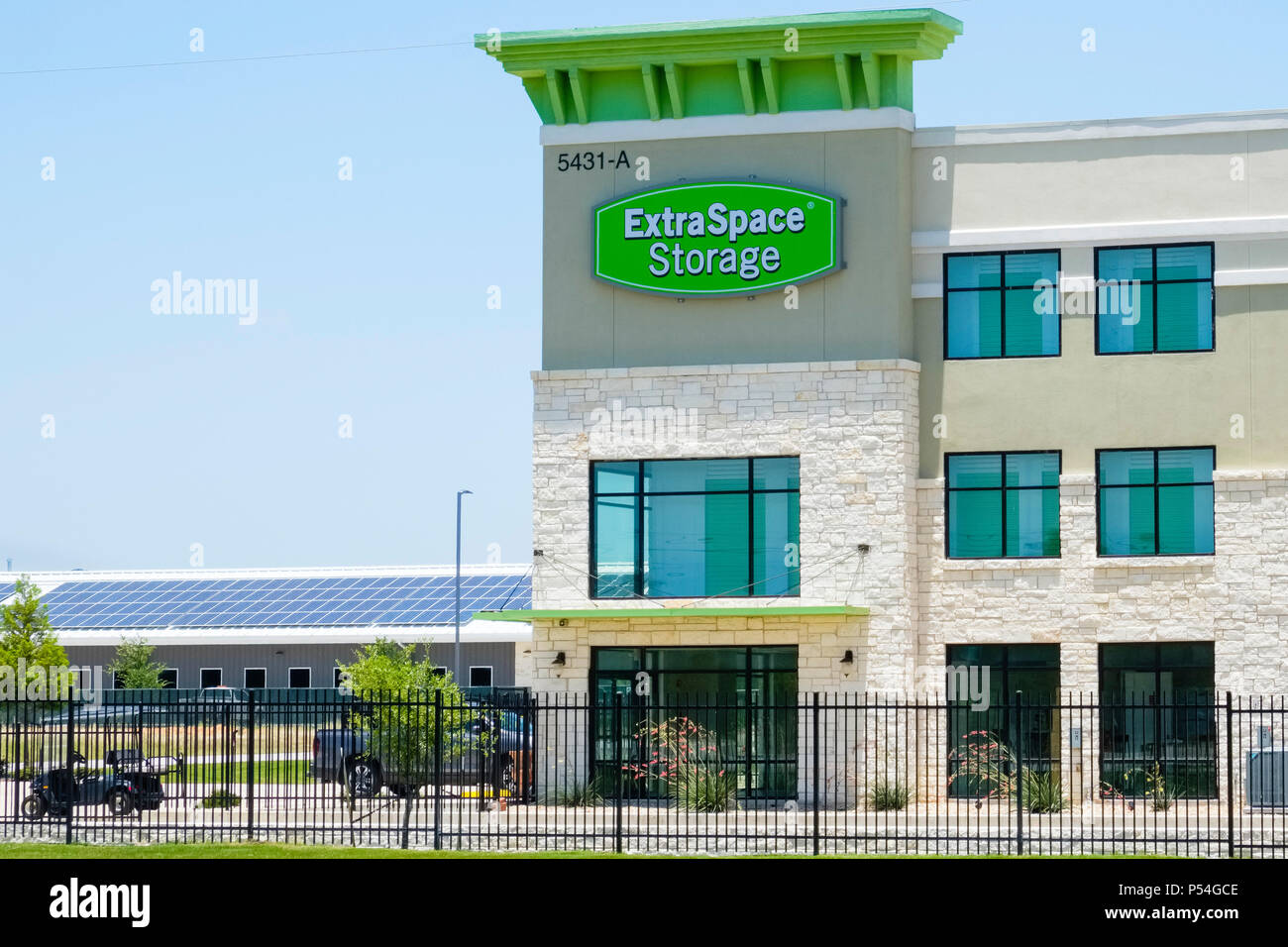 Multistory self-storage building store front Stock Photo - Alamy