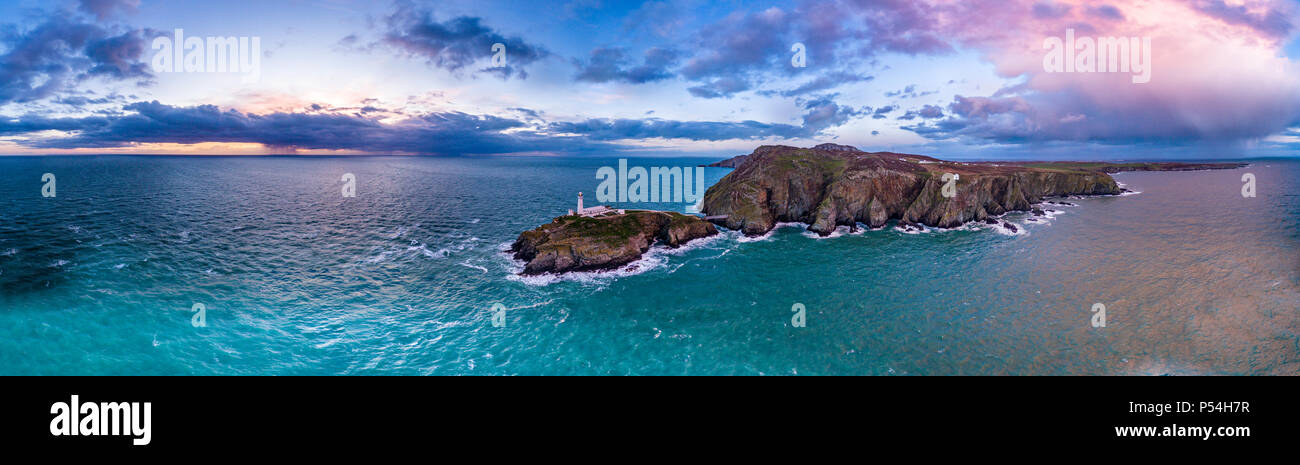 Aerial view of South Stack with lighthouse during sunset Stock Photo ...