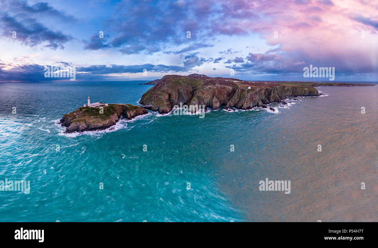 Aerial view of South Stack with lighthouse during sunset Stock Photo ...