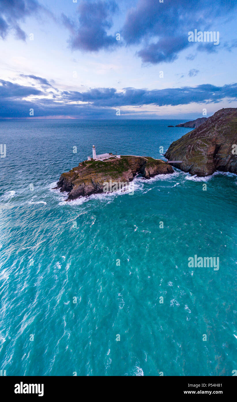 Aerial view of South Stack with lighthouse during sunset Stock Photo ...