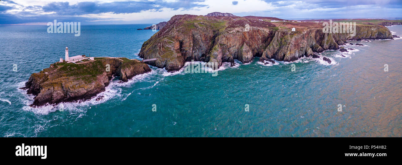 Aerial view of South Stack with lighthouse during sunset Stock Photo ...