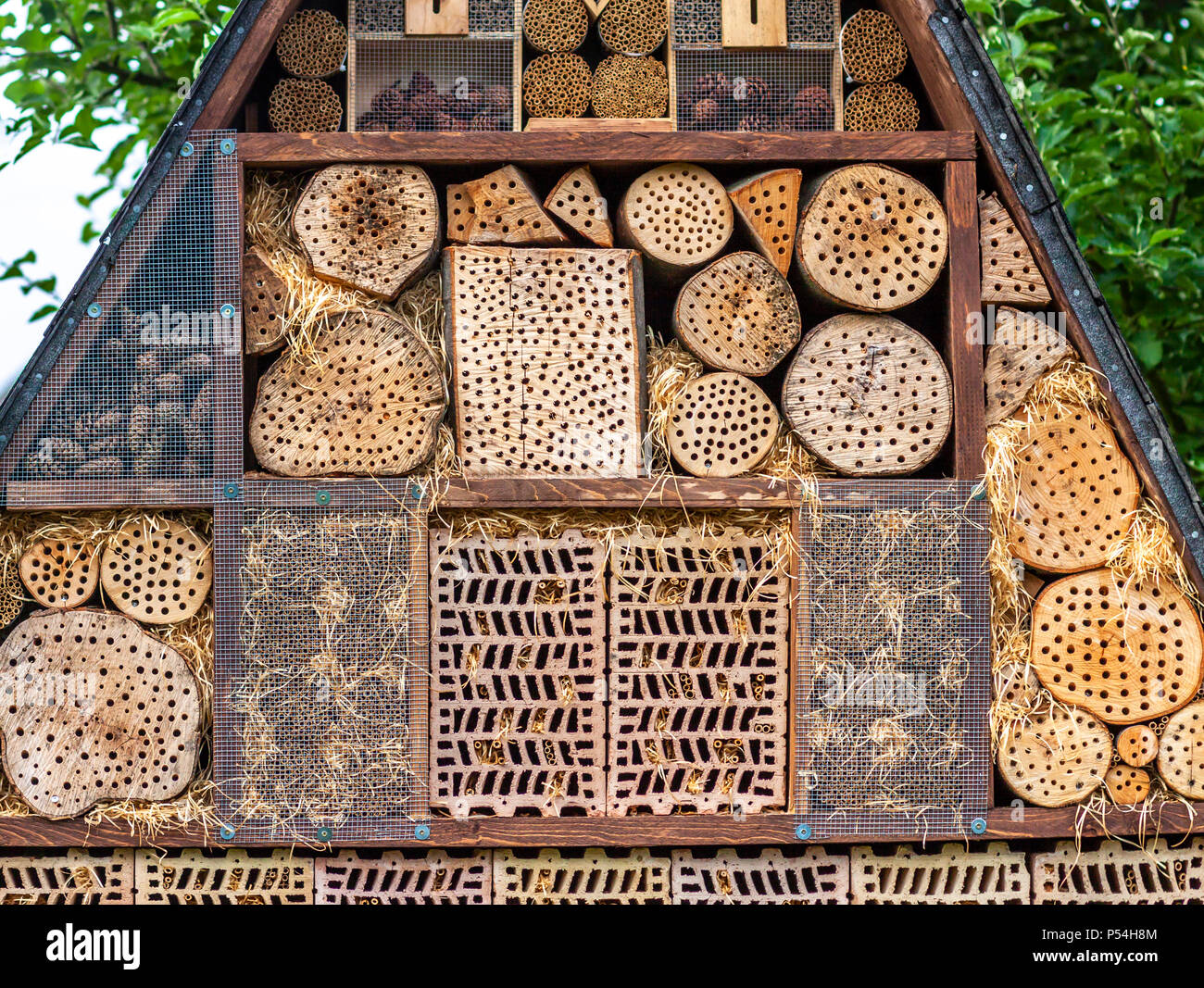 An insect hotel for wasps and bees hi-res stock photography and images ...