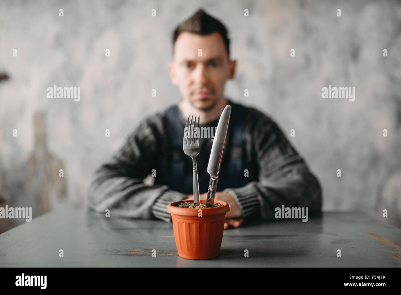 Concept man back with knife hi-res stock photography and images - Alamy