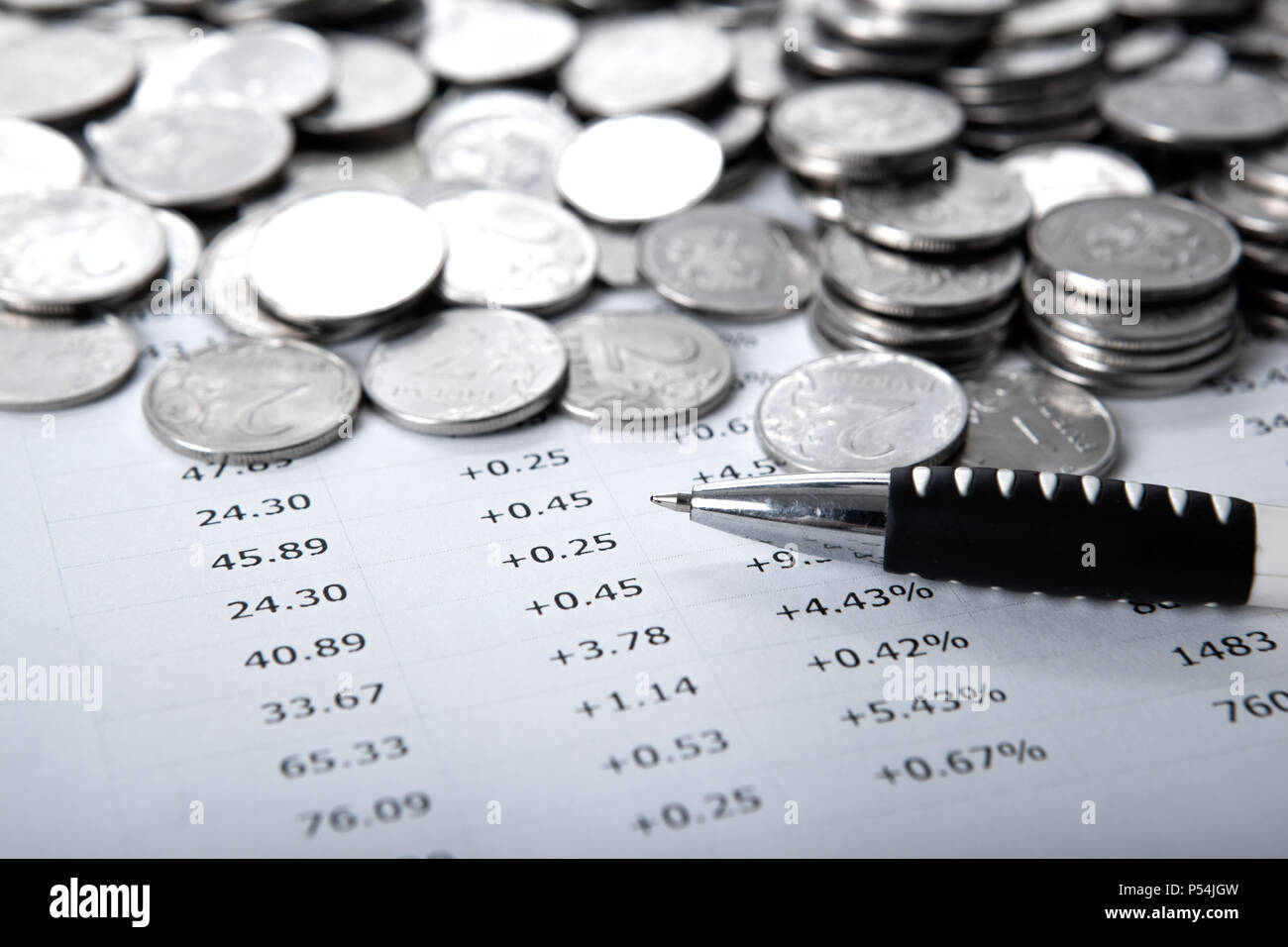 pile of coins and counting close up Stock Photo - Alamy