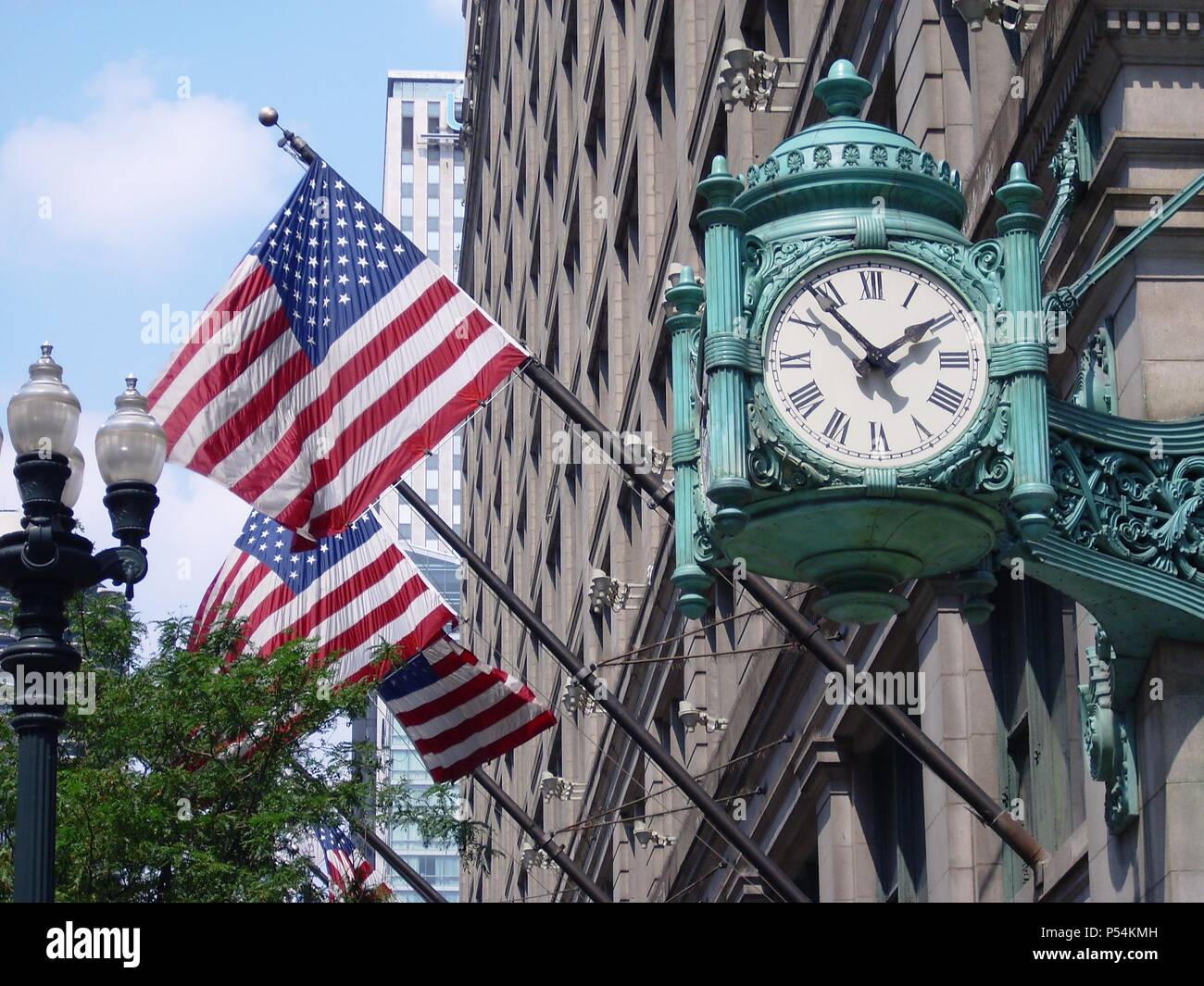 Marshall Field's clock over american flags on State Street in Chicago ...