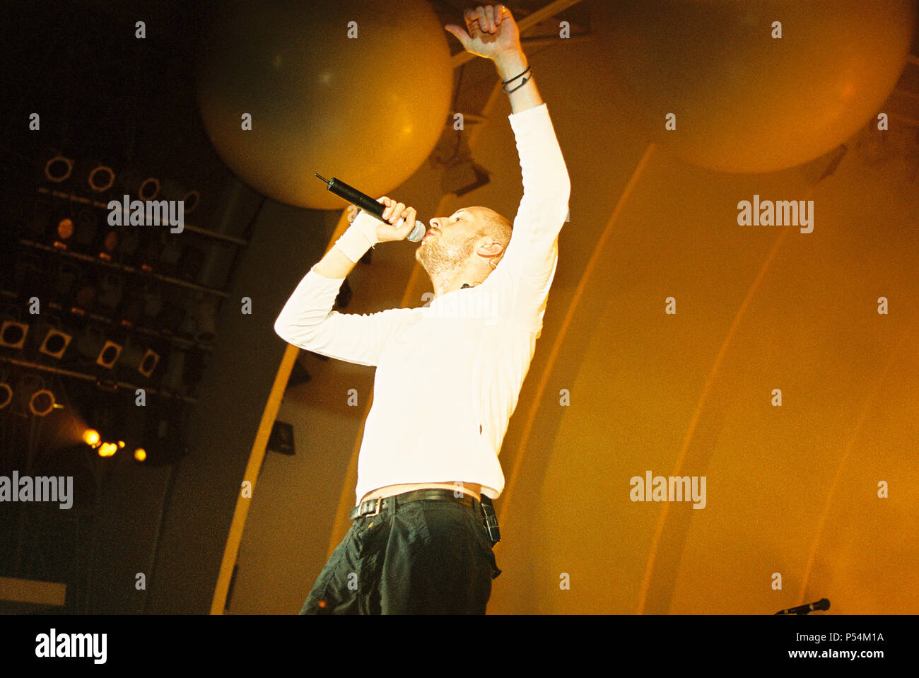 Lead singer of the pop band coldplay hi-res stock photography and ...
