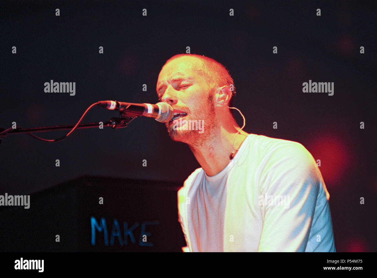 Chris Martin lead singer in Coldplay performing at the Hollywood Bowl ...
