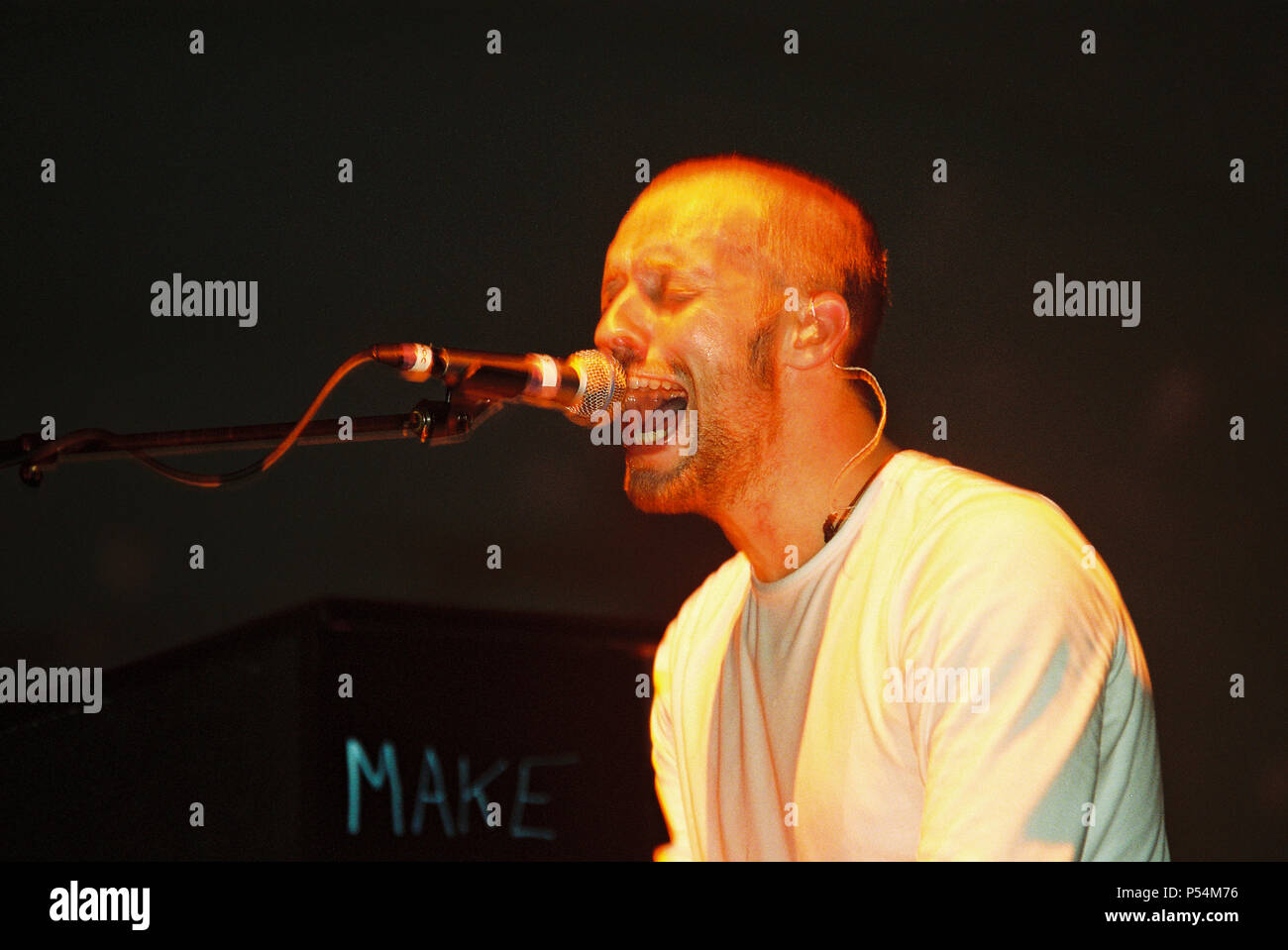Chris Martin lead singer in Coldplay performing at the Hollywood Bowl ...