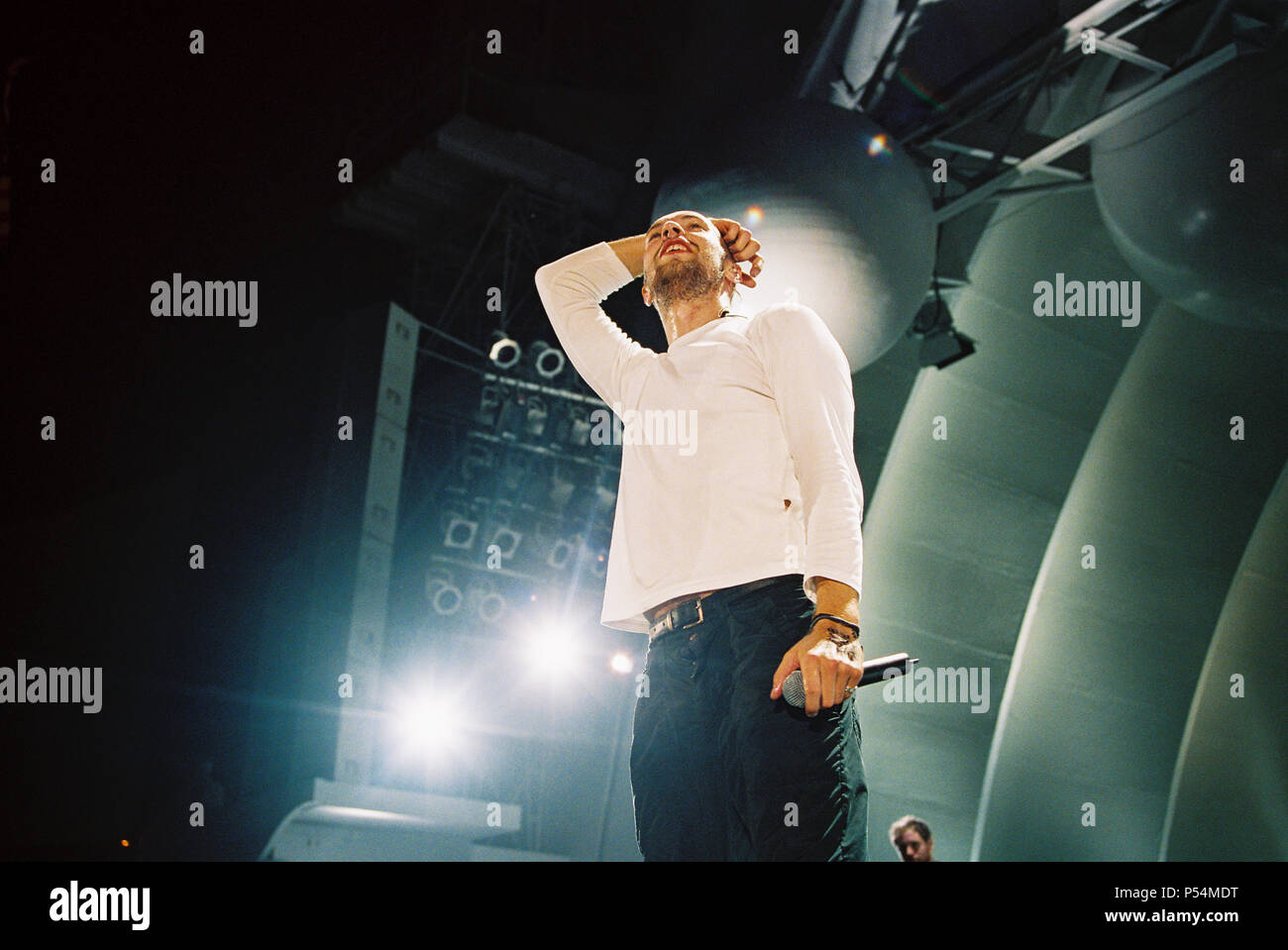 Chris Martin lead singer in Coldplay performing at the Hollywood Bowl ...