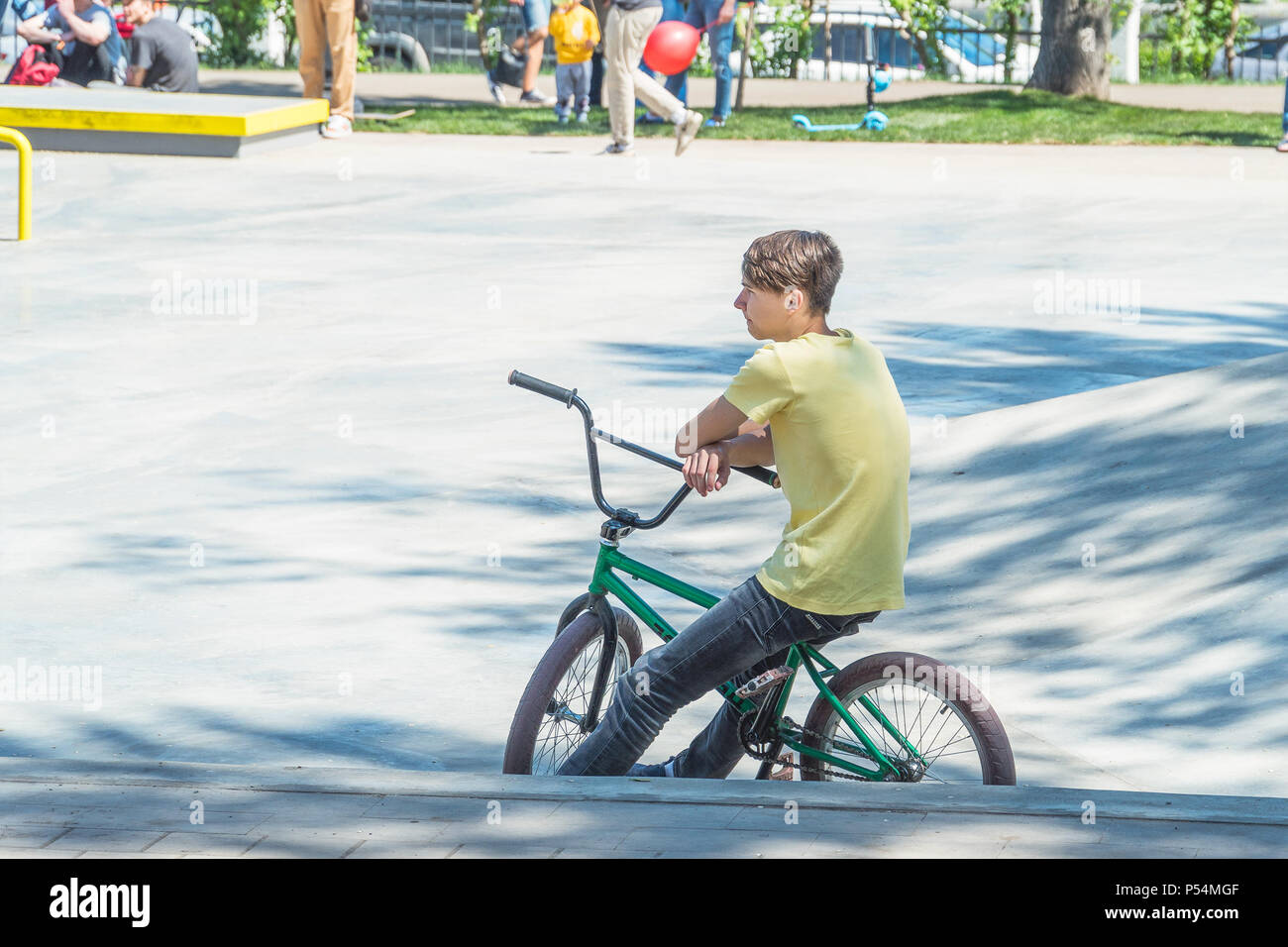 Cyclist sitting on a BMX bike in the Park Stock Photo - Alamy