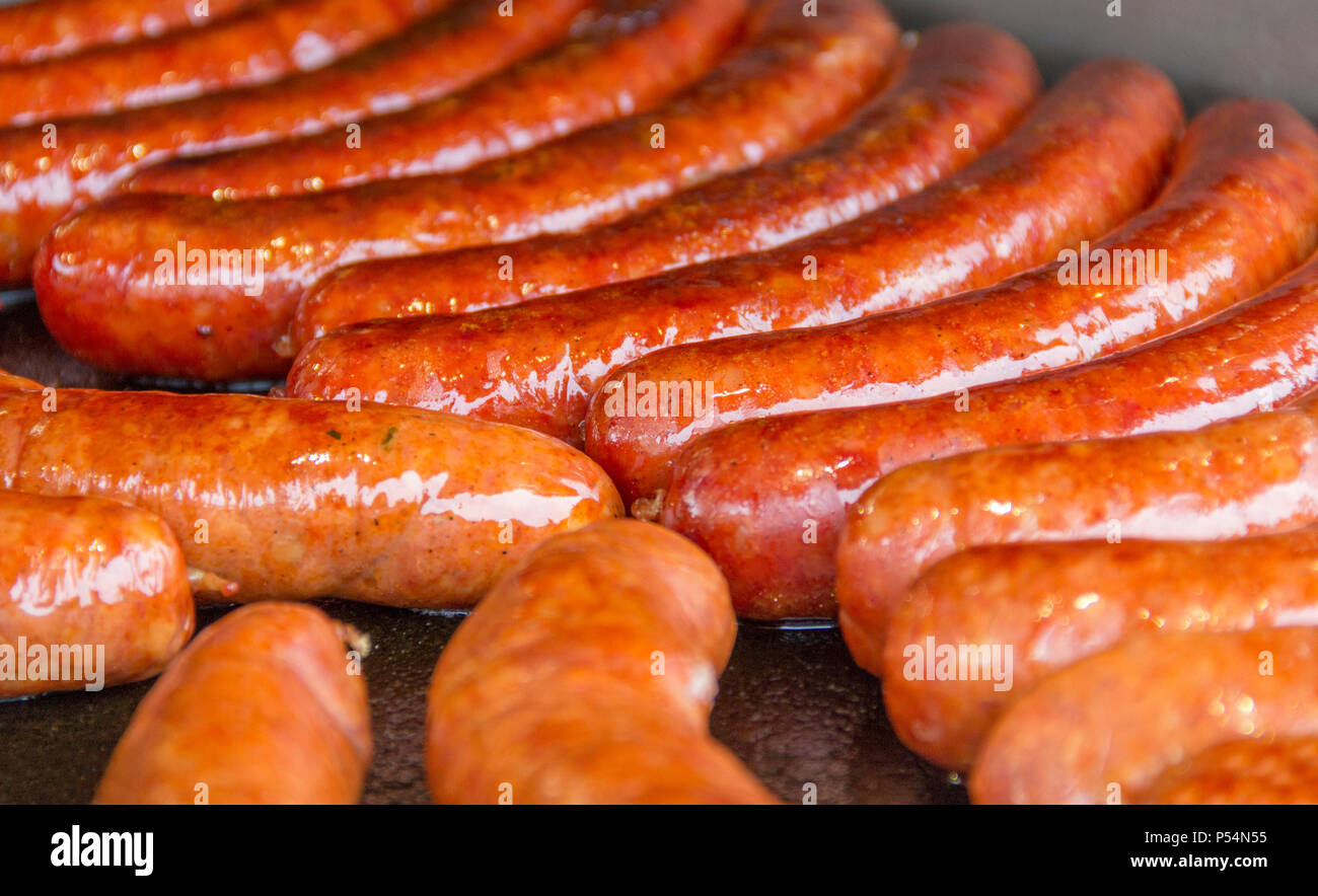 closeup barbecue scenery showing roasted sausages Stock Photo - Alamy