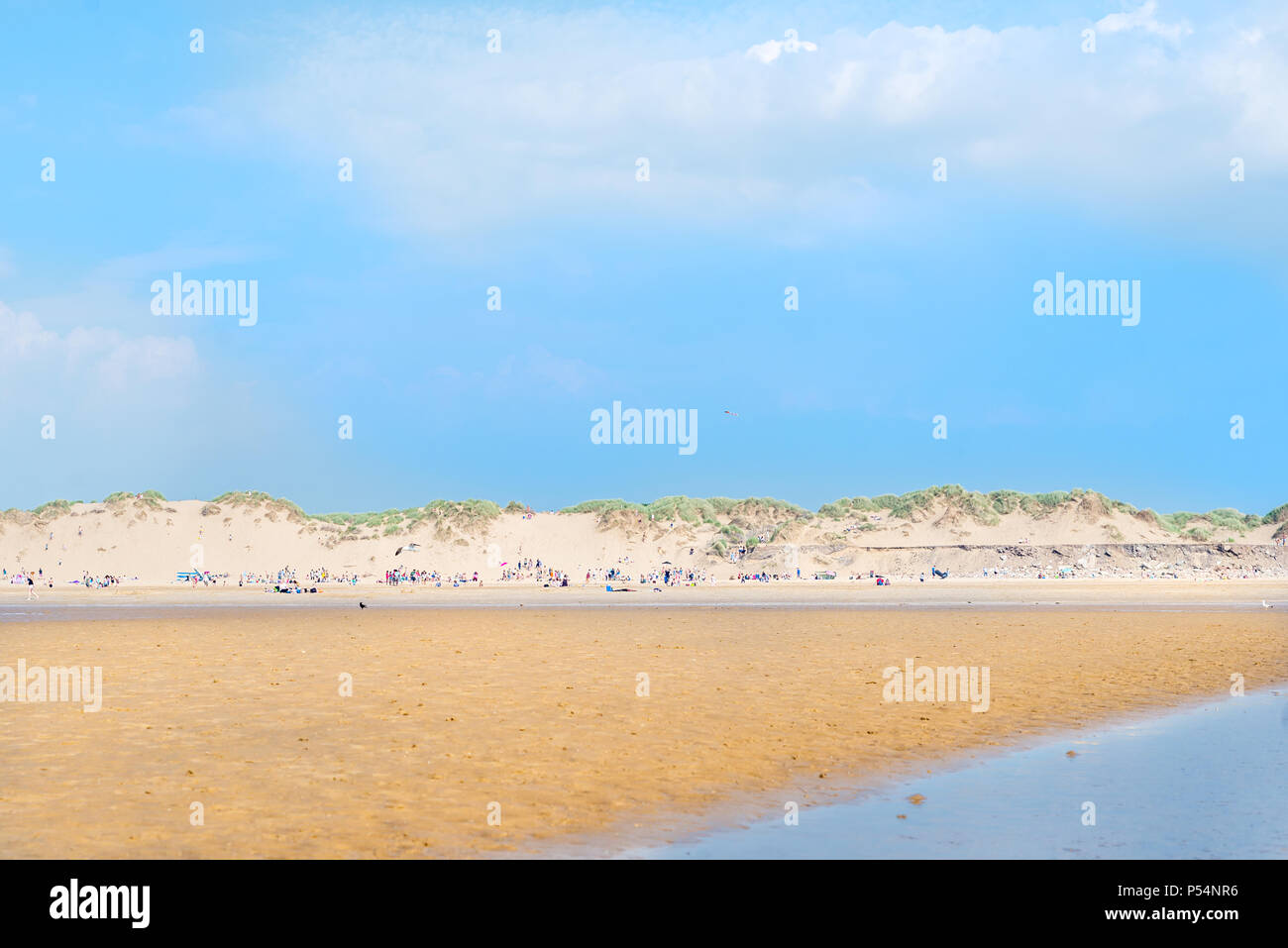 Sandy Formby Beach near Liverpool on a sunny day with lots of people ...