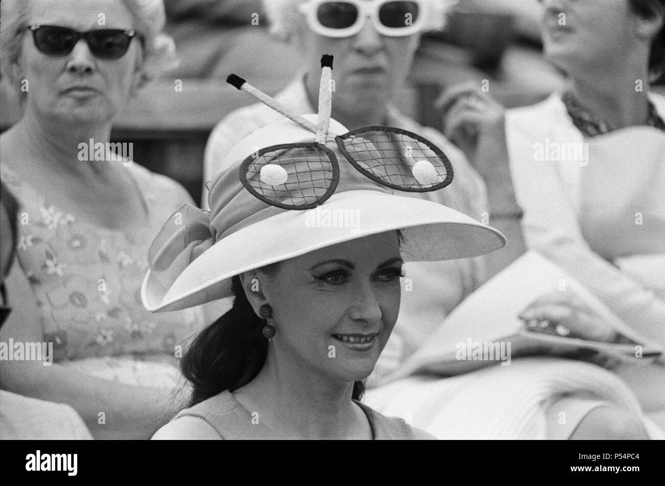 Spectator wearing a Black and White Stock Photos & Images - Alamy