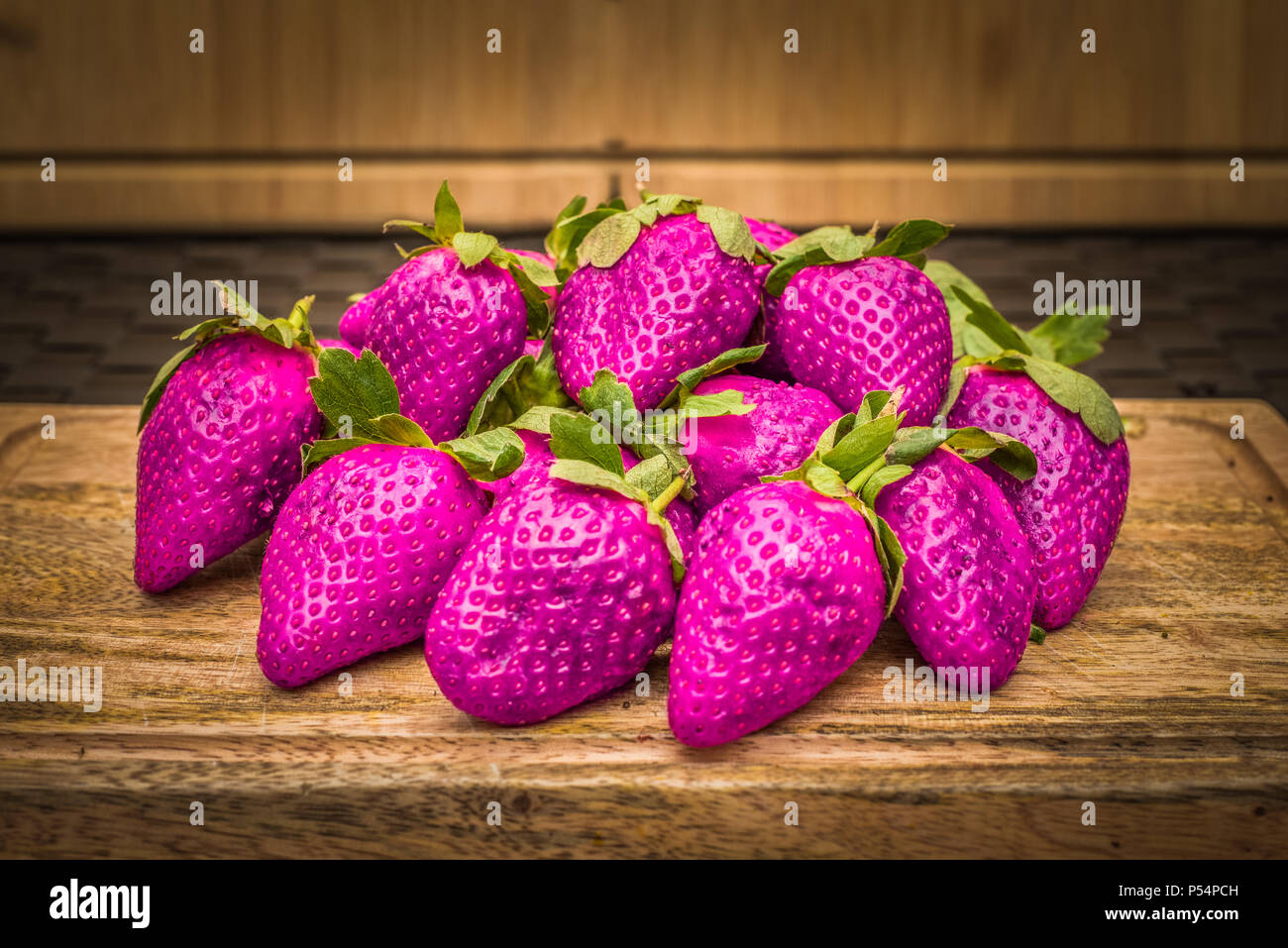 Pink coloured strawberries Stock Photo - Alamy