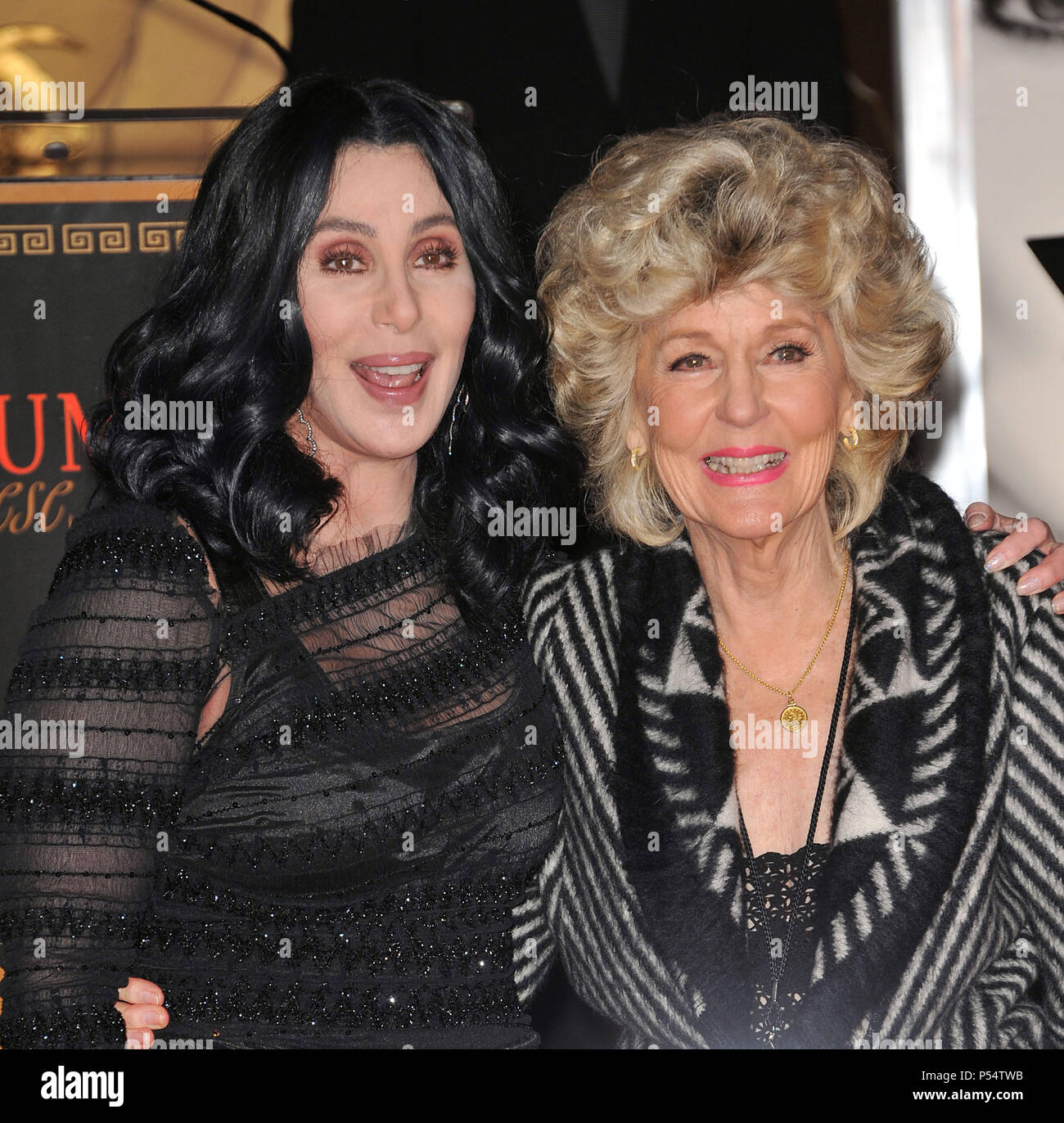 CHER and her mom Chaz at the Hand and Foot Print at the Chinese Theatre ...