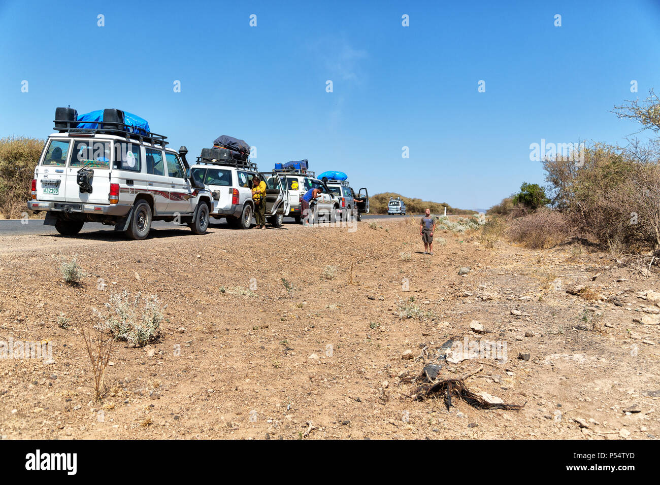 ETHIOPIA,DANAKIL-CIRCA JANUARY 2018--unidentified people and car in the ...