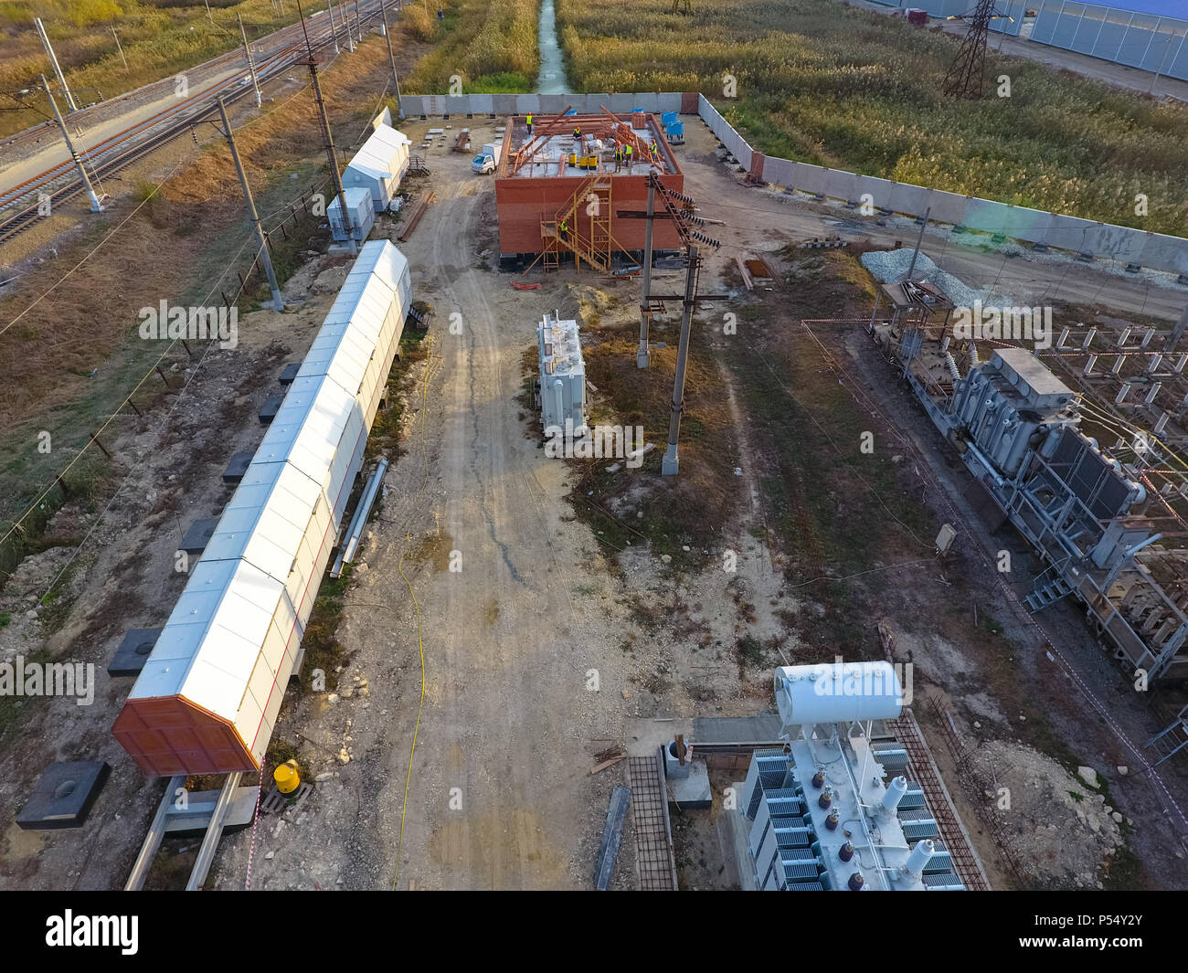 Construction of a transformer substation near the railway Stock Photo ...