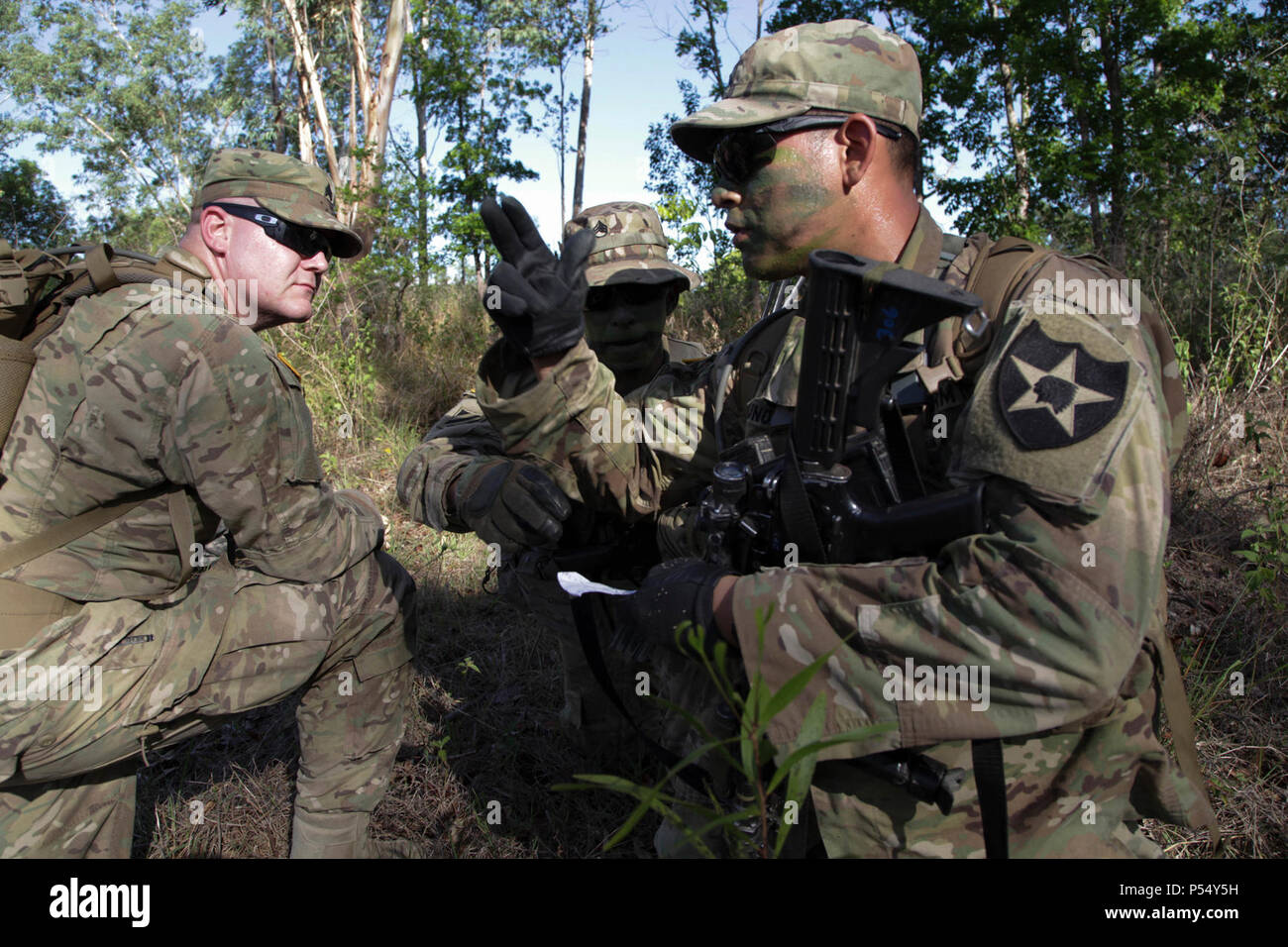 U.S. Army Sgt. Robert Carrigan, Staff Sgt. Eric Taylor, and Sgt. Homero ...