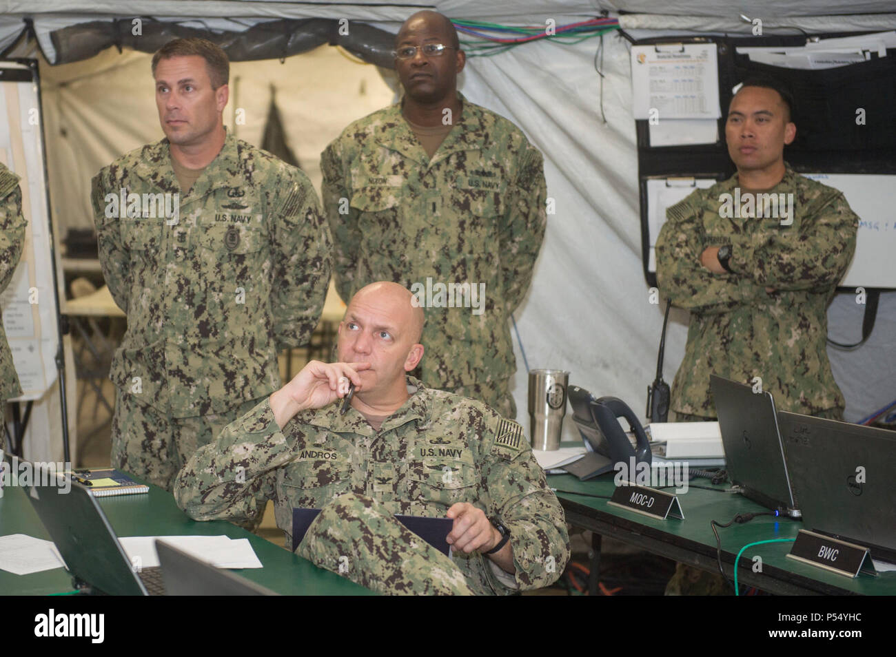 Capt. Bradley Andros, the Commodore of Command Task Force 56, is ...