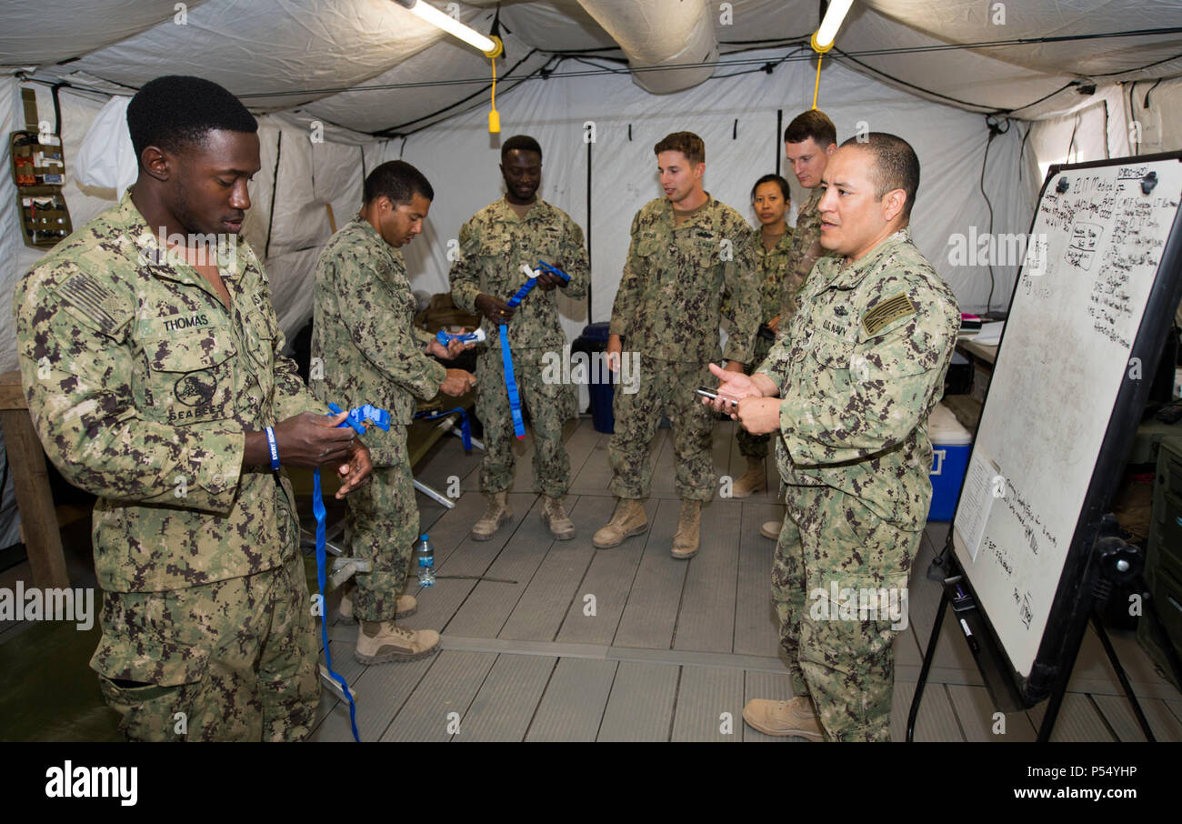 Sailors assigned to Task Force 56 practice applying tourniquets for ...