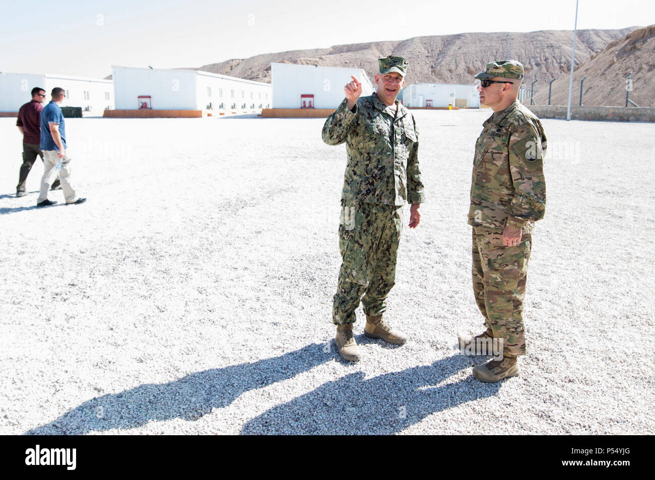 Capt. Bradley Andros, the Commodore of Task Force 56, gives Brig. Gen ...