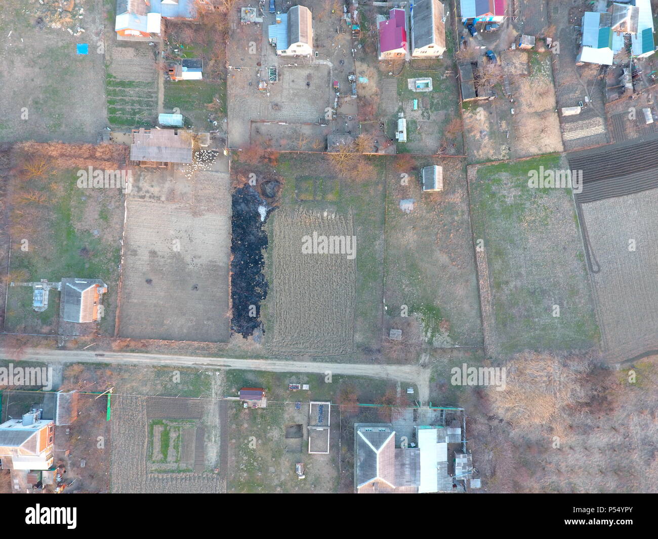Plots of land for building. Compound and vegetable gardens. View from ...