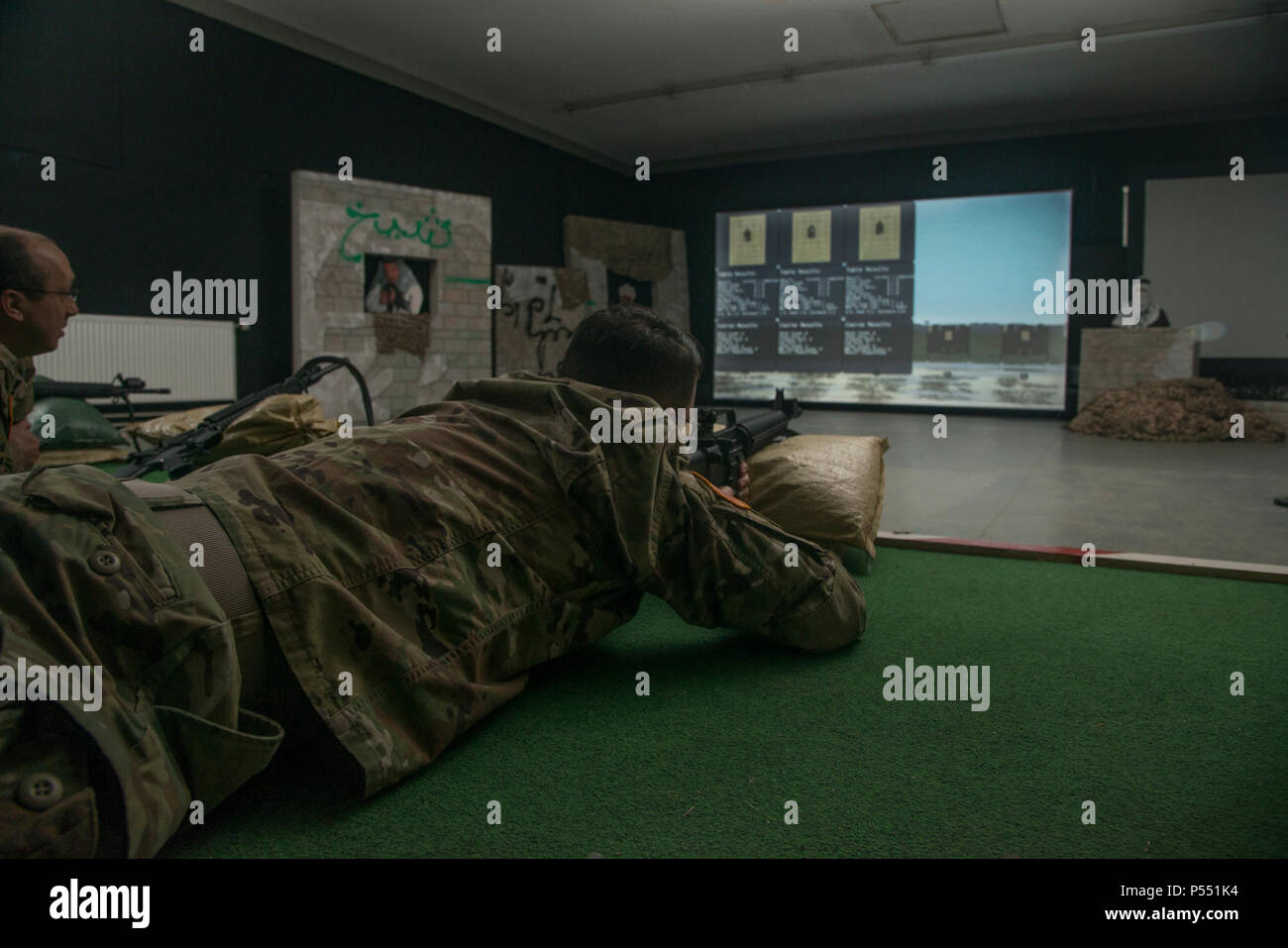 U.S. Soldiers train using the Engagement Skills Trainer II, EST II, at ...