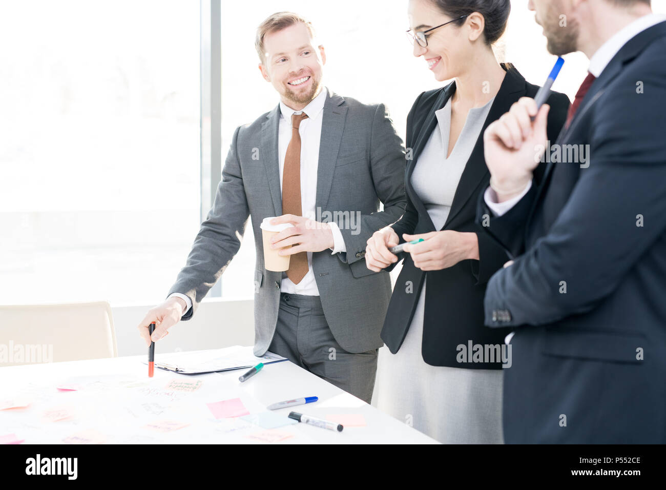 Collaborating group man hi-res stock photography and images - Alamy