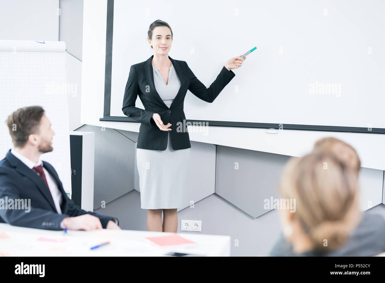 Woman giving speech in seminar hi-res stock photography and images - Alamy