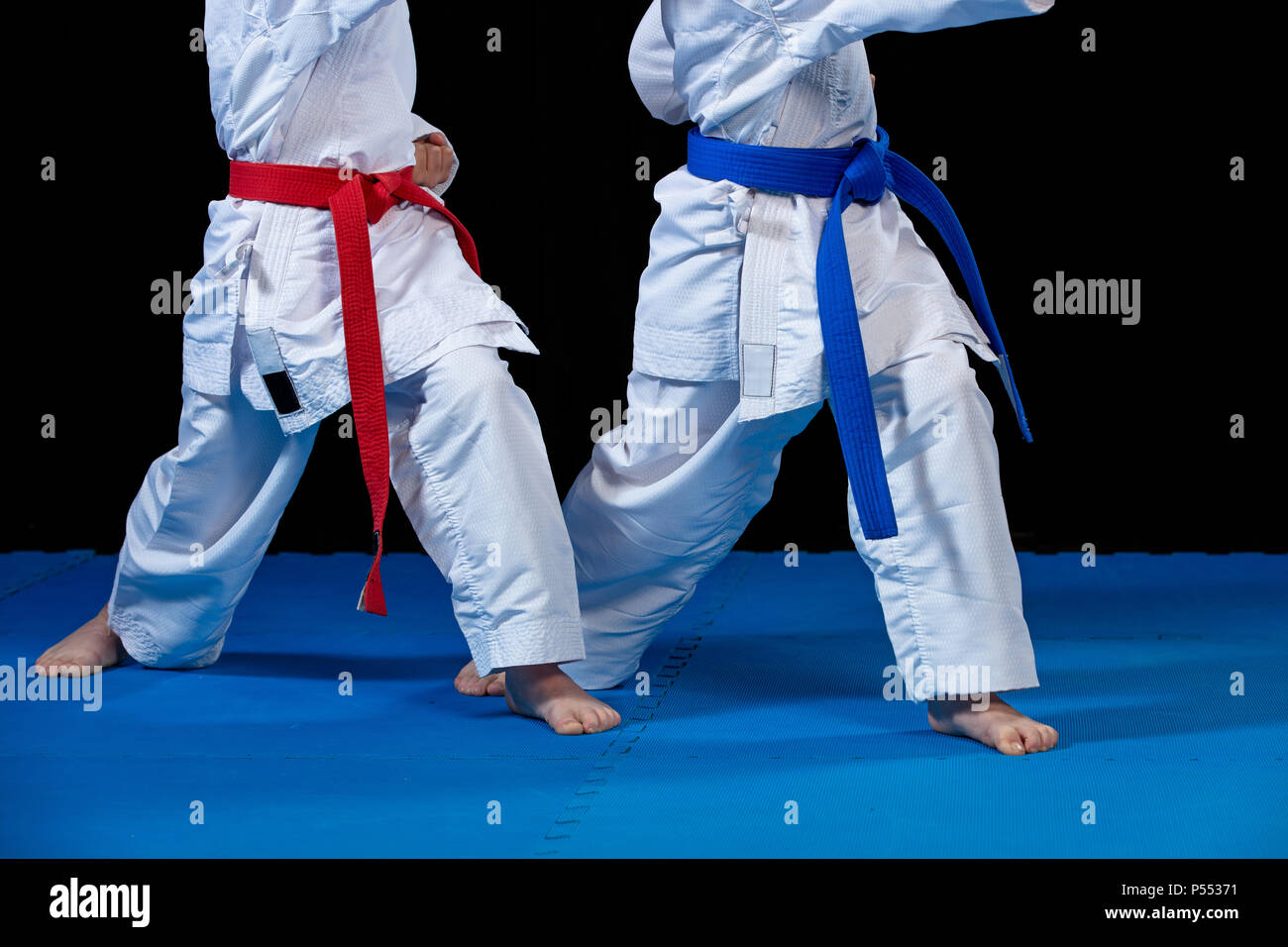 two boys training karate kata exercises at test qualification Stock ...