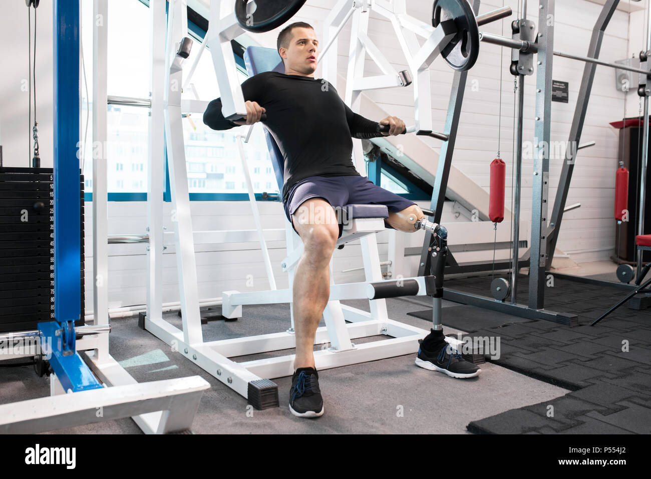 Adaptive Athlete Working Out in Gym Stock Photo - Alamy