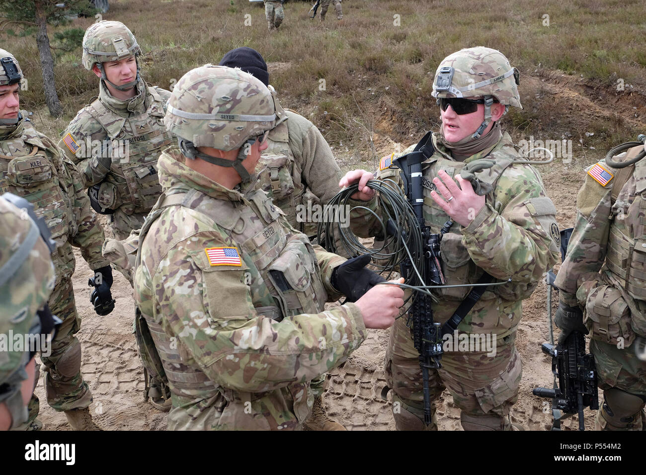 Battle Group Poland Soldier Ssg. Jeremy Hudson demonstrates which knots ...