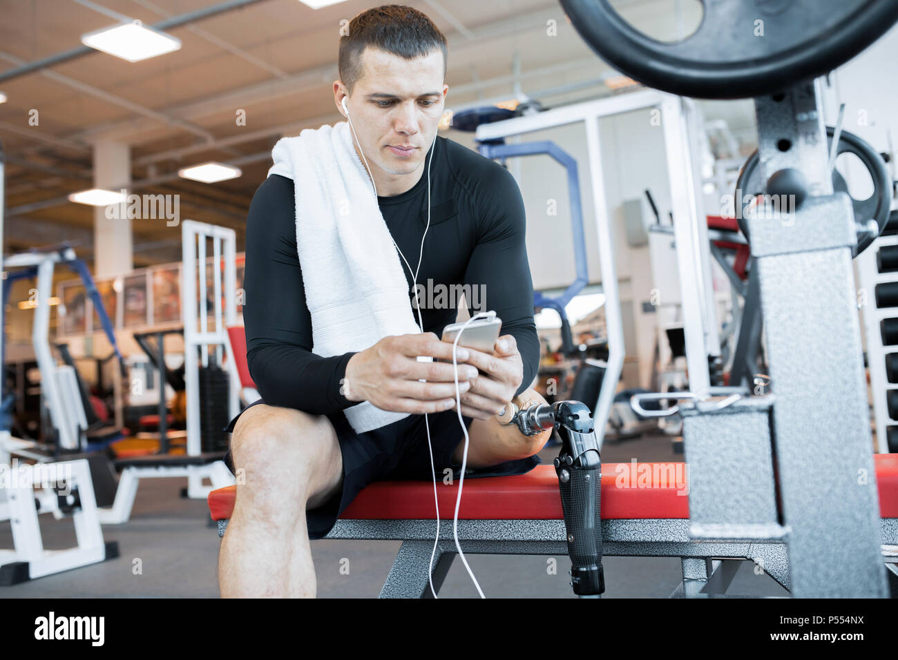 Adaptive Athlete Taking Break in Gym Stock Photo - Alamy