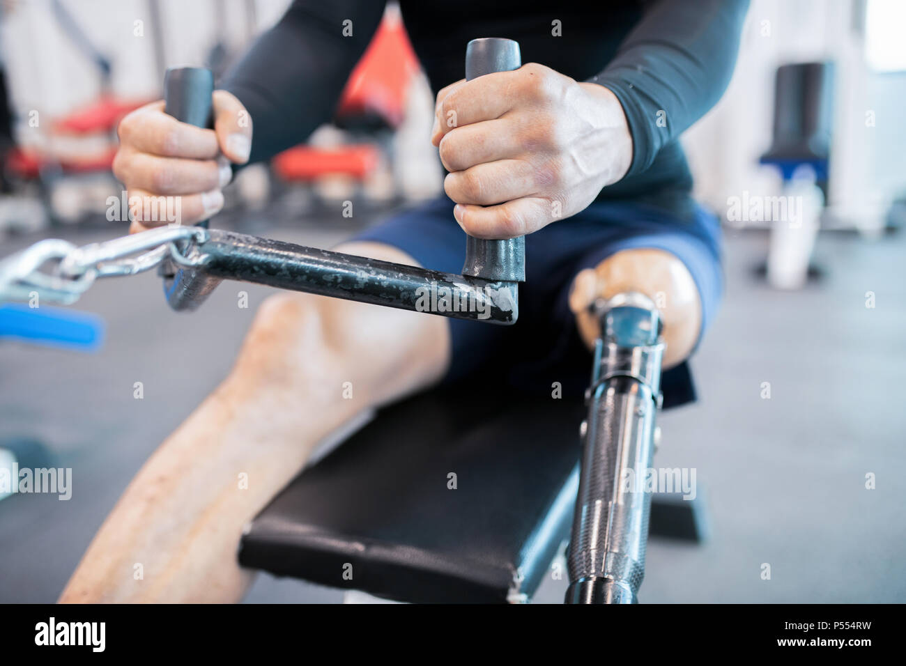 Adaptive Athlete Using Rowing Machine Close up Stock Photo - Alamy