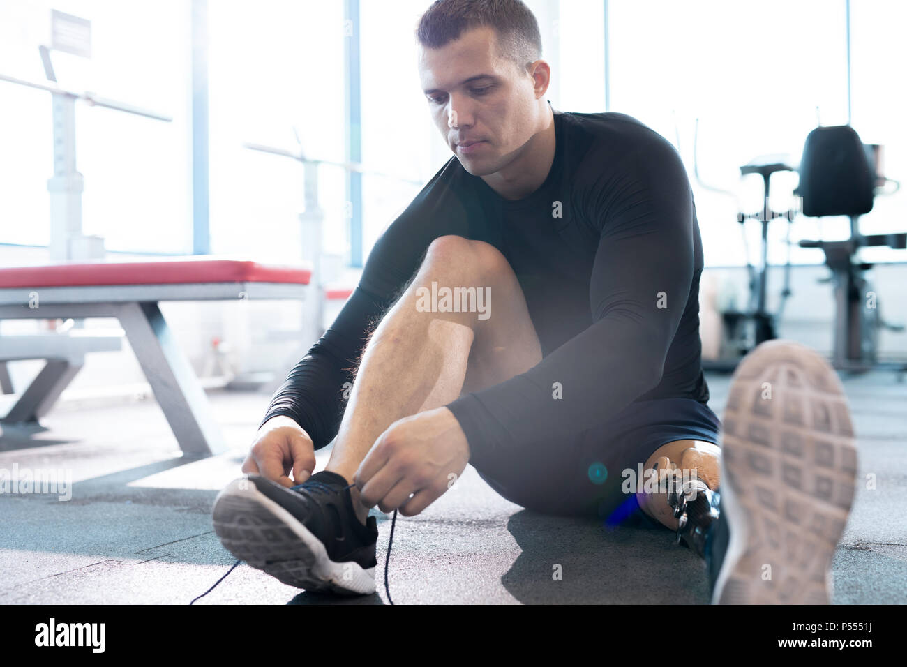 Man tying shoe lace hi-res stock photography and images - Alamy