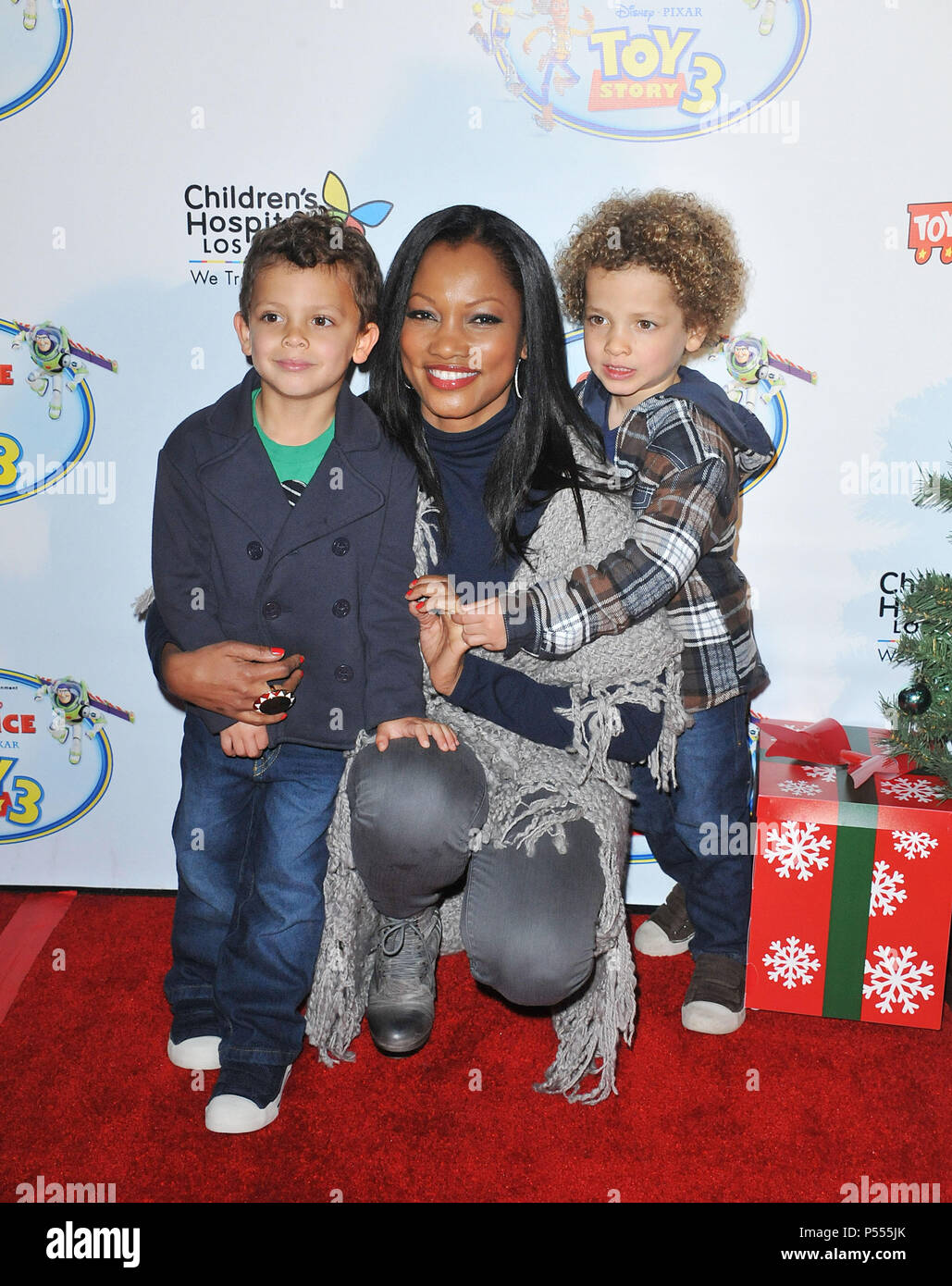 Garcelle Beauvais, kids at Toy Story 3 On Ice To benefit the Children ...