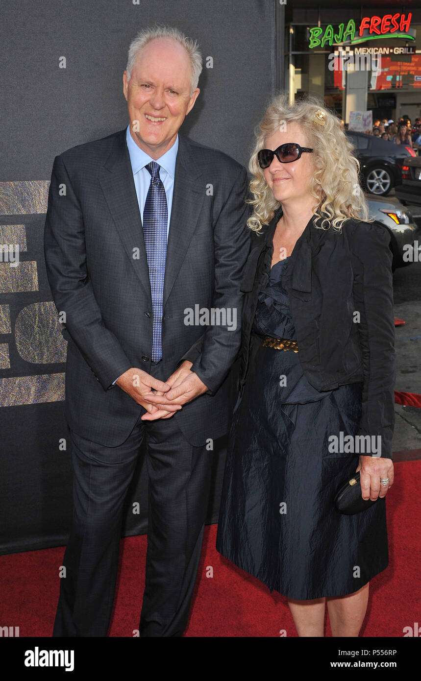 John Lithgow, wife , arriving at the Rise of The Planet Of The Apes ...