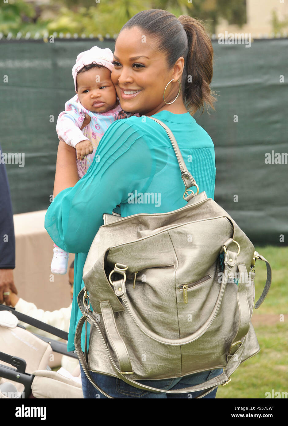 Laila Ali, daughter Sydney at the Pediatric Aid Foundation 2011 at the ...