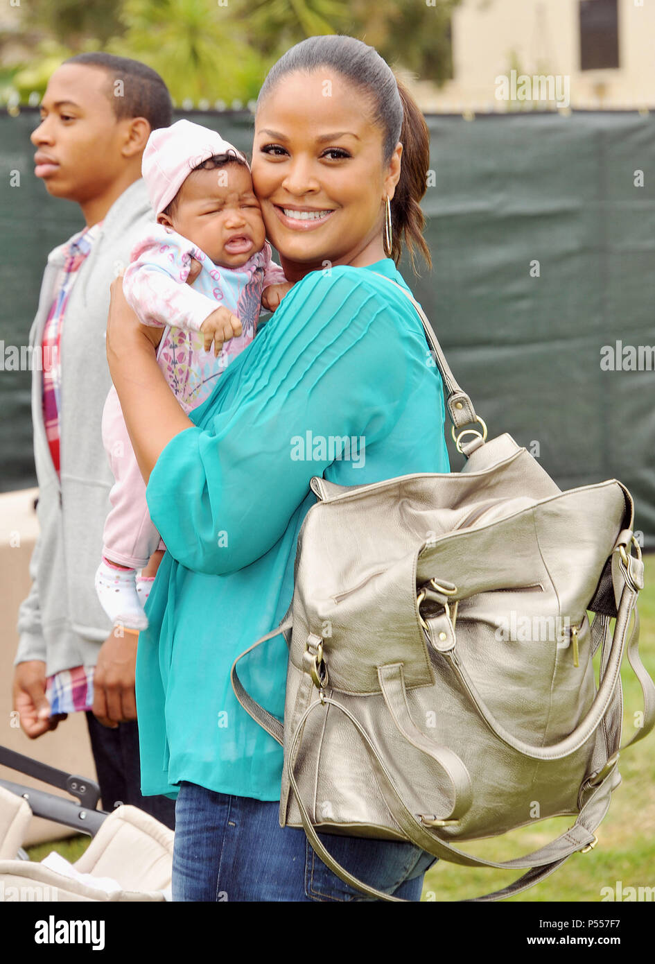 Laila Ali, daughter Sydney at the Pediatric Aid Foundation 2011 at the ...