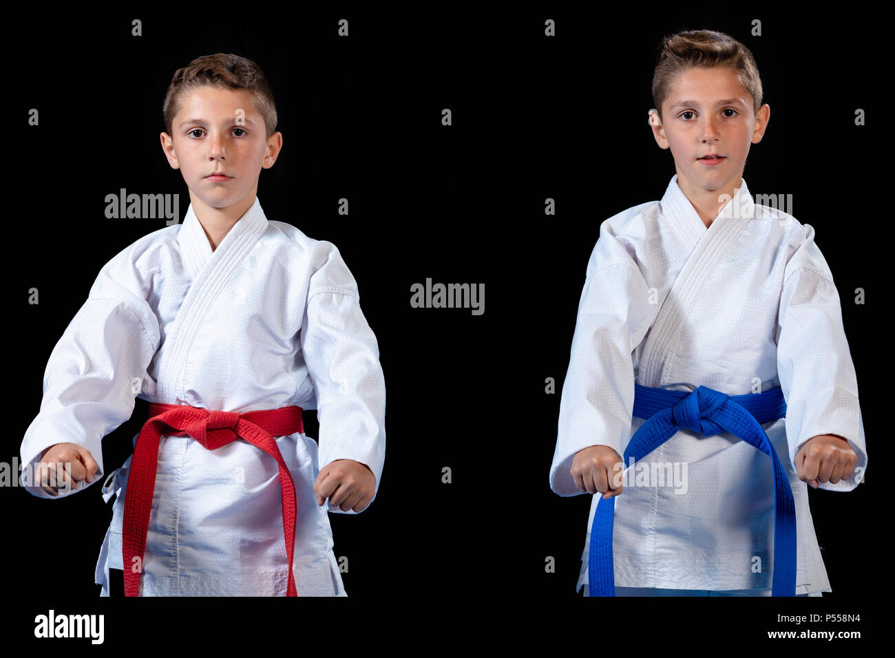 two boys training karate kata exercises at test qualification Stock ...
