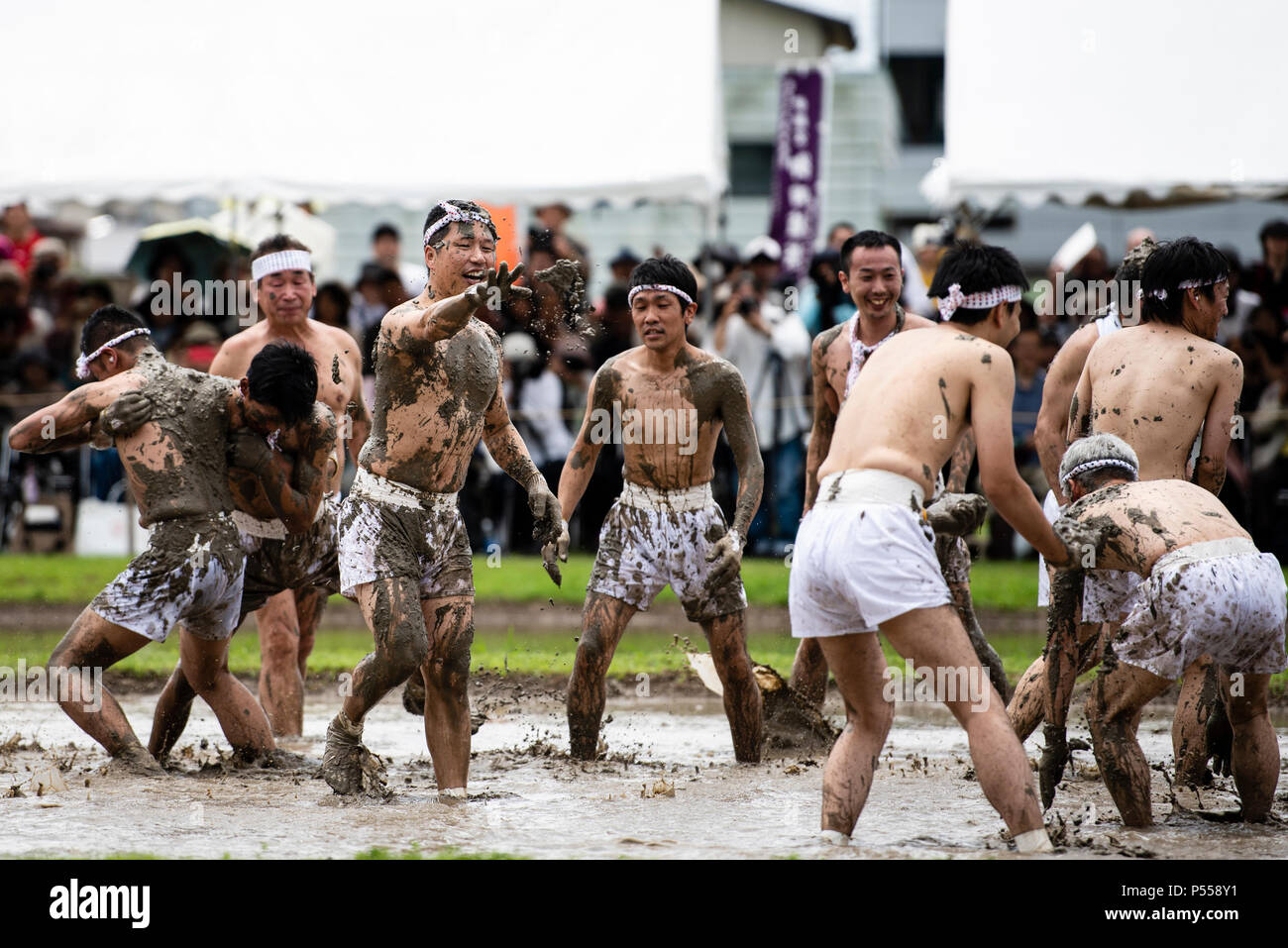 JUNE 24, 2018 - Men fight in a muddy rice field during Isobe-no-Omita ...